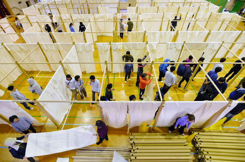 Architect's cardboard tube and cloth partitions bring privacy to ...