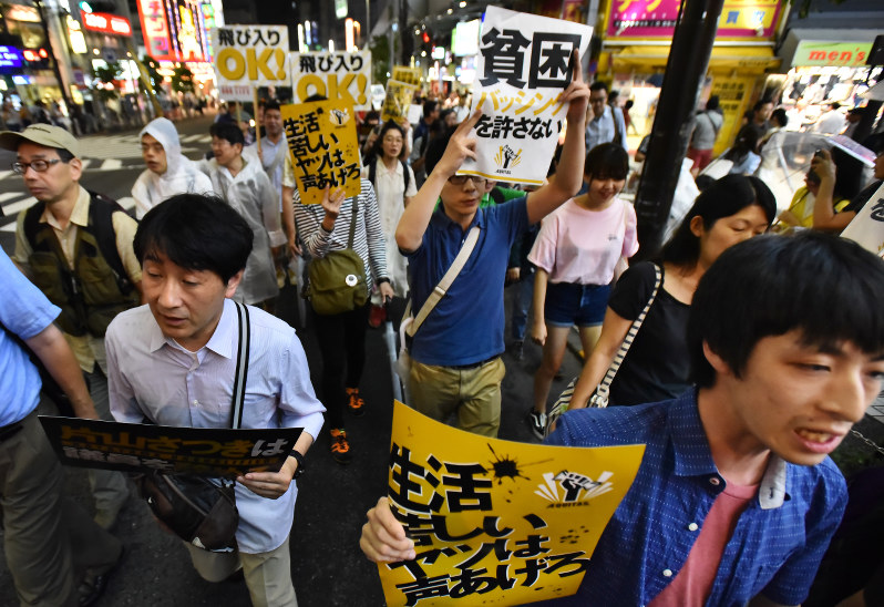 Hundreds join protest against online bashing of poor in downtown Tokyo ...