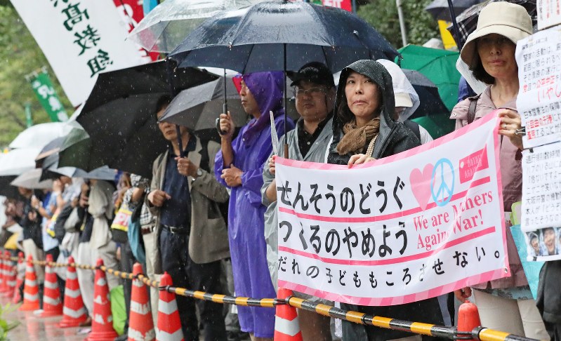 Protest rallies held across Japan 1 year after security laws passed by ...