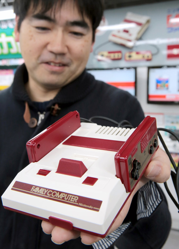 Nintendo launches palm-sized retro 'Famicom' game console - The Mainichi