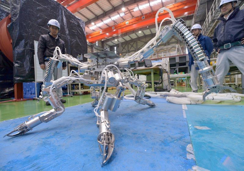 In Photos: Factory unveils 'muscle robots' for Fukushima nuke plant ...