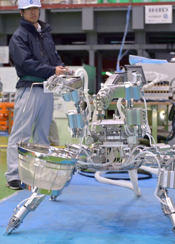 In Photos: Factory unveils 'muscle robots' for Fukushima nuke plant ...