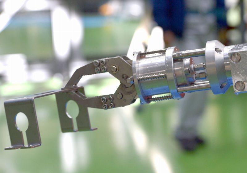 In Photos: Factory unveils 'muscle robots' for Fukushima nuke plant ...