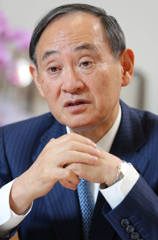 Chief Cabinet Secretary Suga describes ties with China as 'smooth ...