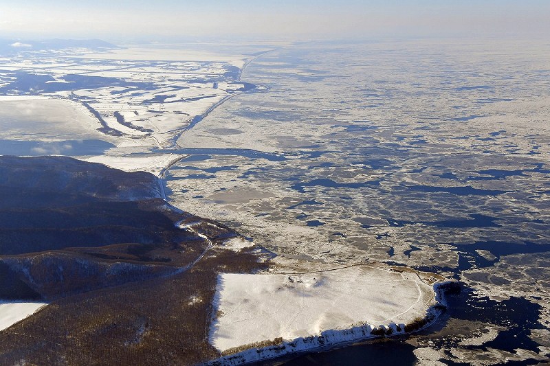 In Photos: Rare huge swirl of drift ice reaches Hokkaido city coast ...