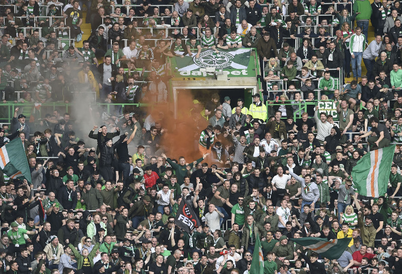 Soccer: Celtic clinches Scottish league title by thrashing Rangers ...