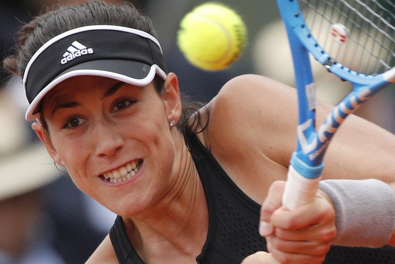Tennis: Muguruza, Halep set up French Open semifinal; Nadal in limbo ...