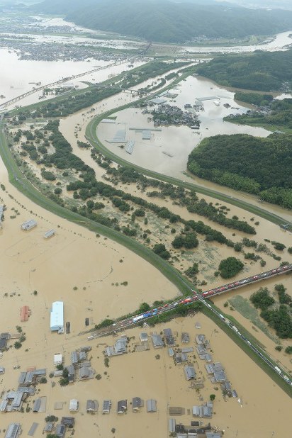 In Photos: Torrential rain leaves trail of flooding, damage in western ...