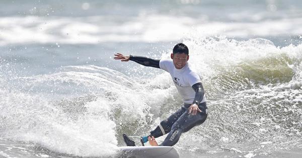 In Photos: Disability no barrier to snagging waves in 'adaptive surfing ...