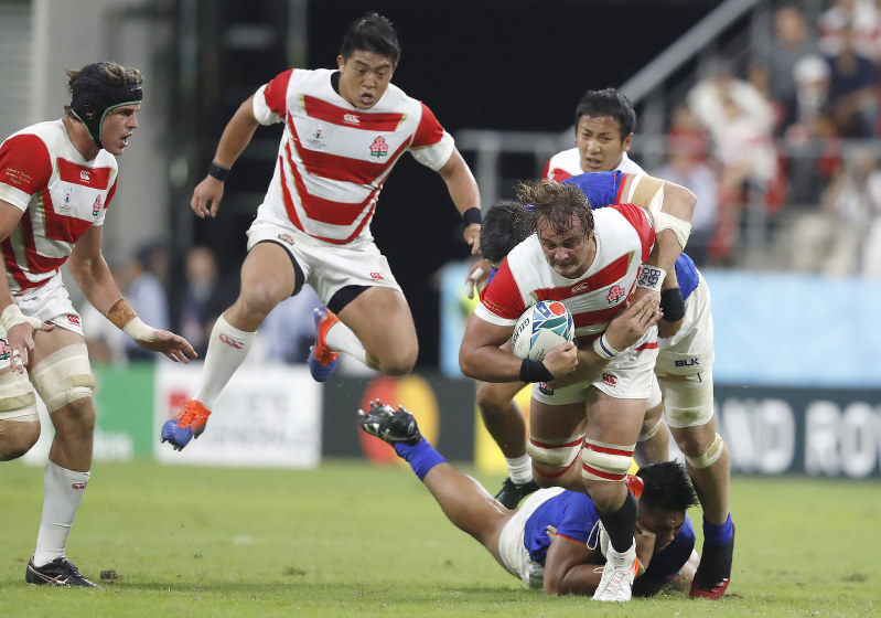 In Photos: Japan charges on at Rugby World Cup with win over Samoa ...