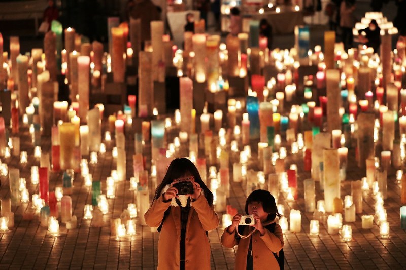 In Photos: 15,000 candles lit up for environmental event near Osaka ...