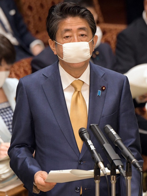 Japan PM Abe says punishable stay-at-home orders an option if ...