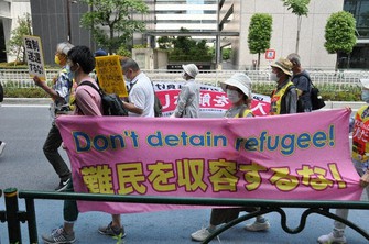 Anti-detention groups protest outside Tokyo immigration center on World ...