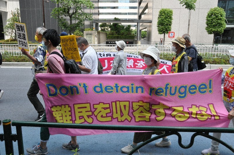 Anti-detention groups protest outside Tokyo immigration center on World ...