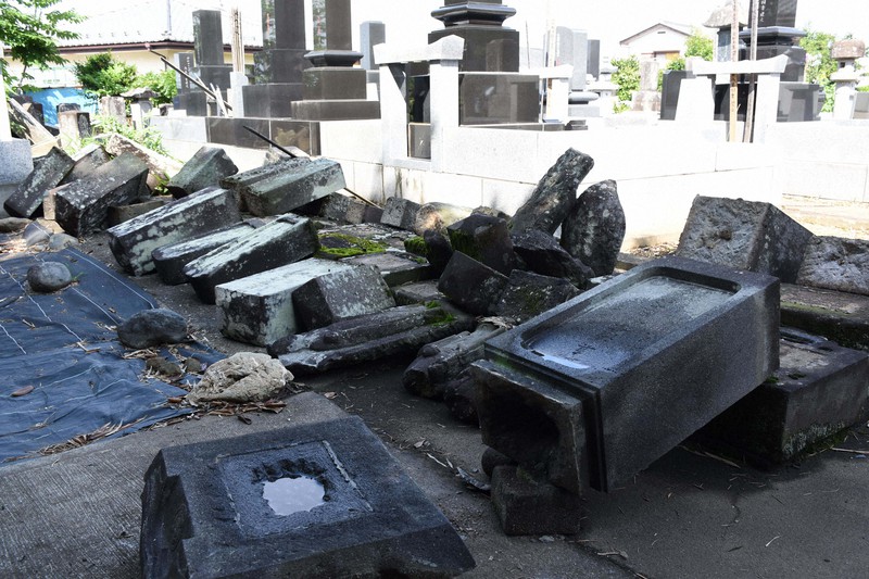 60 gravestones, monuments found knocked down at east Japan temple ...
