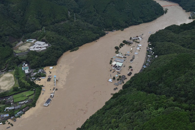 In Photos: Kuma River overflows as record rainfall strikes southwest ...