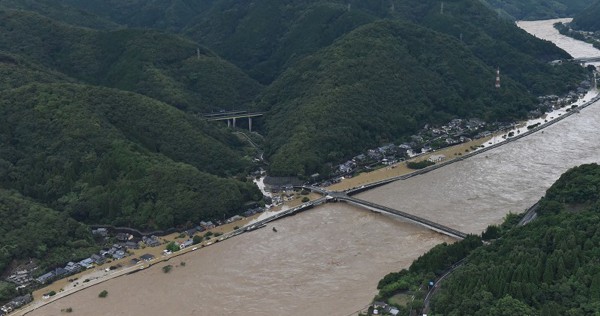 In Photos: Kuma River overflows as record rainfall strikes southwest ...