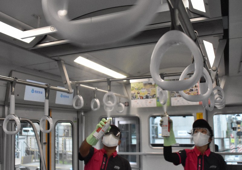 East Japan rail company spraying antiviral coating material inside all ...