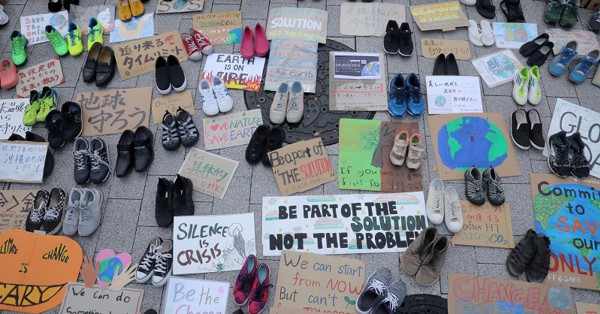 In Photos: Young climate activists in Japan leave 100 shoes outside ...