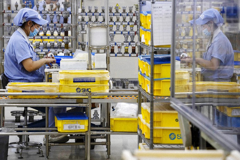 Survey: China's factory, export activity gain in September - The Mainichi