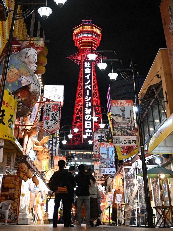 In Photos: Osaka towers lit up in red to signal alert amid virus surge ...