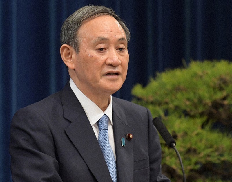 Japan PM Suga corrects remark after saying he'll call snap election 'in ...