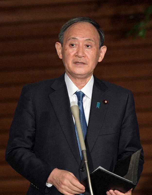 PM Suga under fire over short response to opposition legislator in ...
