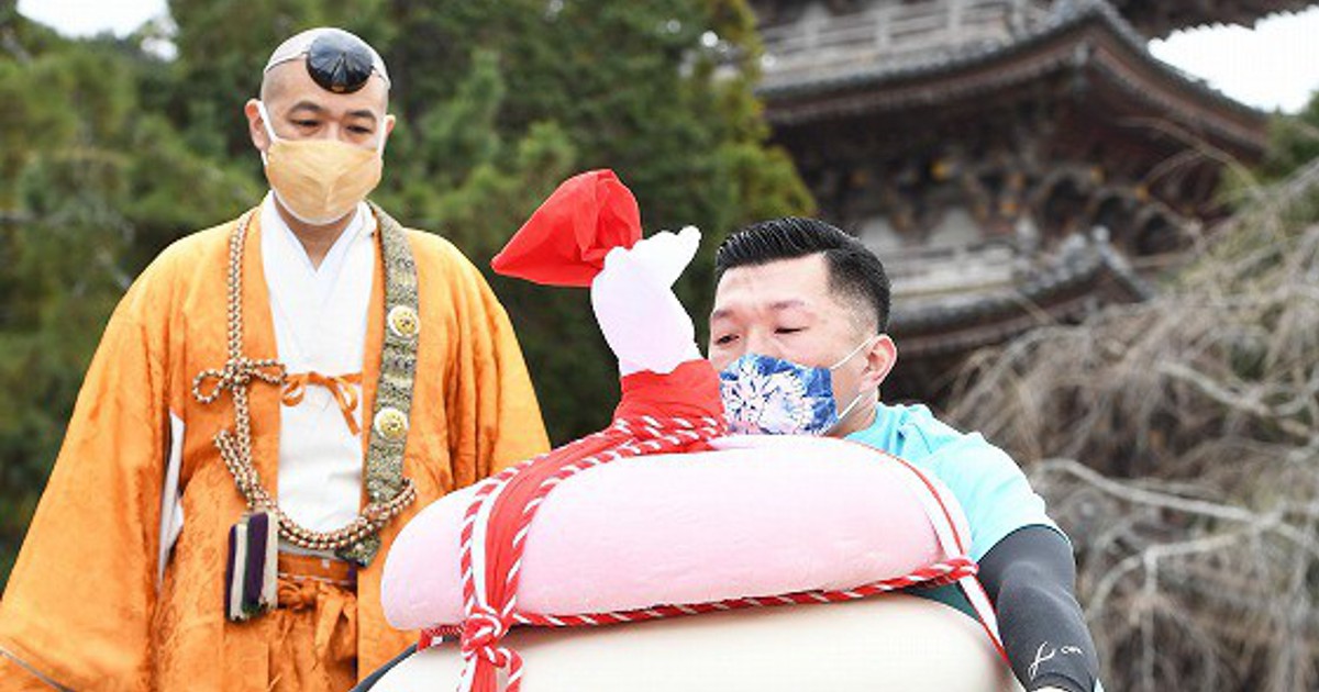 In Photos: Huge rice cakes lifted up to raise spirits at world heritage ...