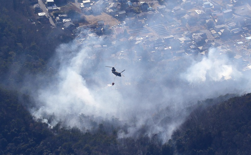 98 more households told to evacuate as Japan forest wildfire burns for ...