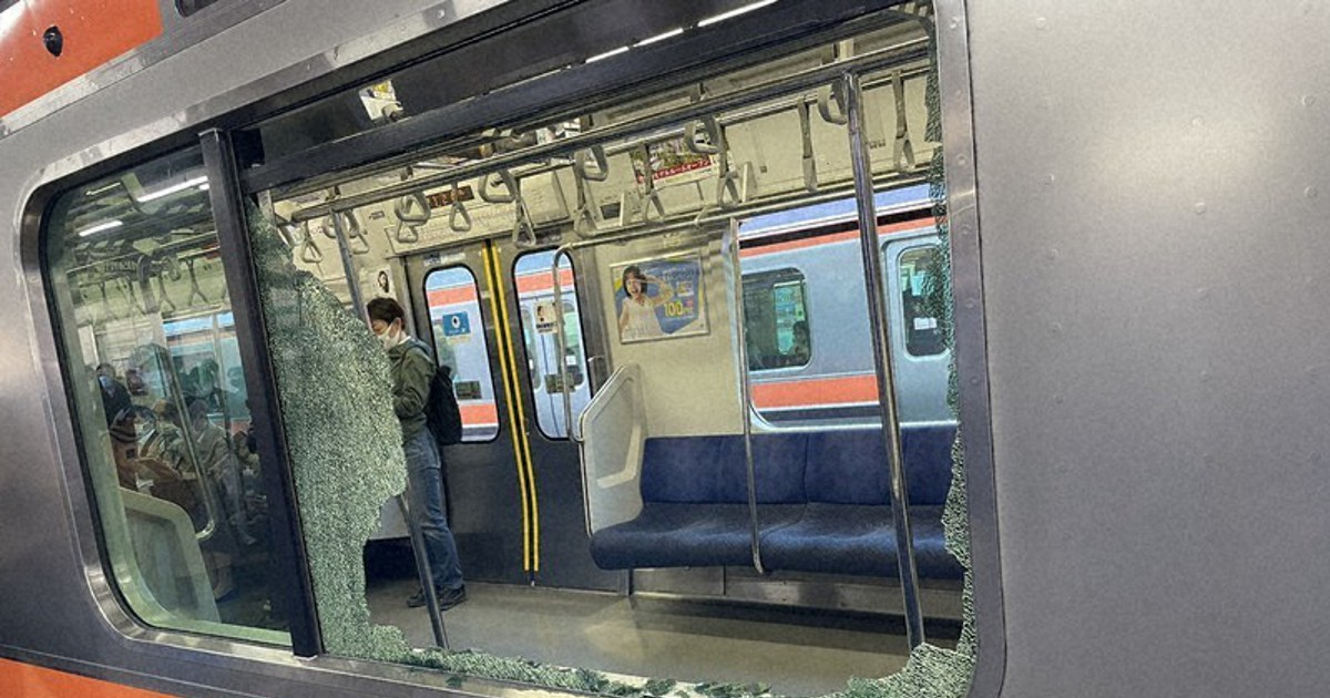 Train makes emergency stop after carriage window shatters in suburban ...