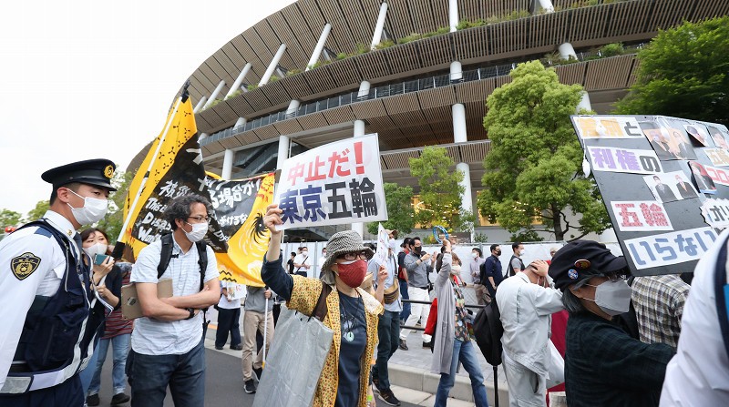 In Photos: Demonstrators protest against Tokyo Olympics in front of ...