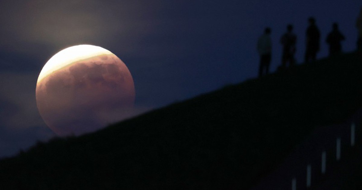 In Photos: Copper moon appears in Japan skies during total lunar ...