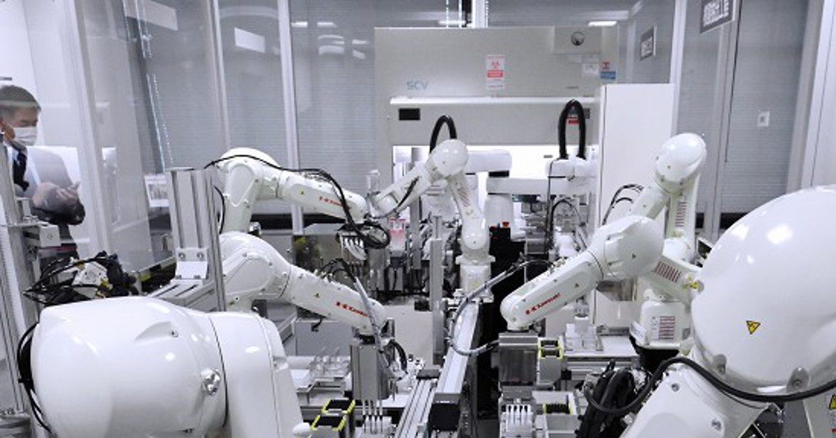 In Photos: Automated PCR testing robots developed by Japan firms ...