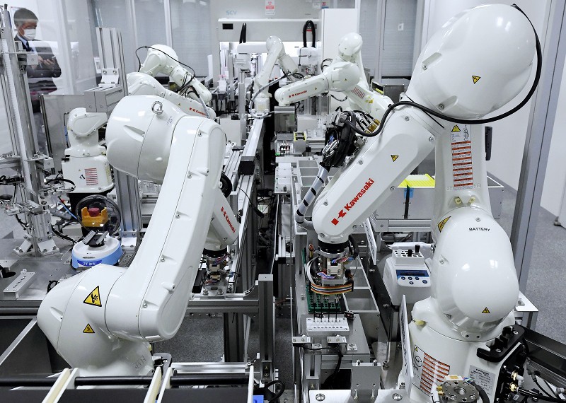 In Photos: Automated PCR testing robots developed by Japan firms ...