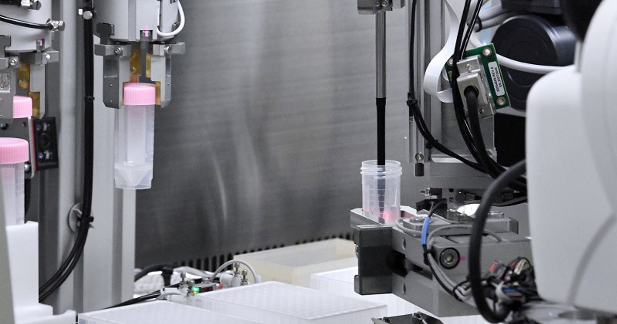 In Photos: Automated PCR testing robots developed by Japan firms ...