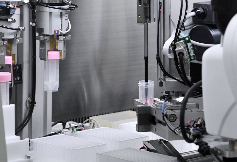 In Photos: Automated PCR testing robots developed by Japan firms ...