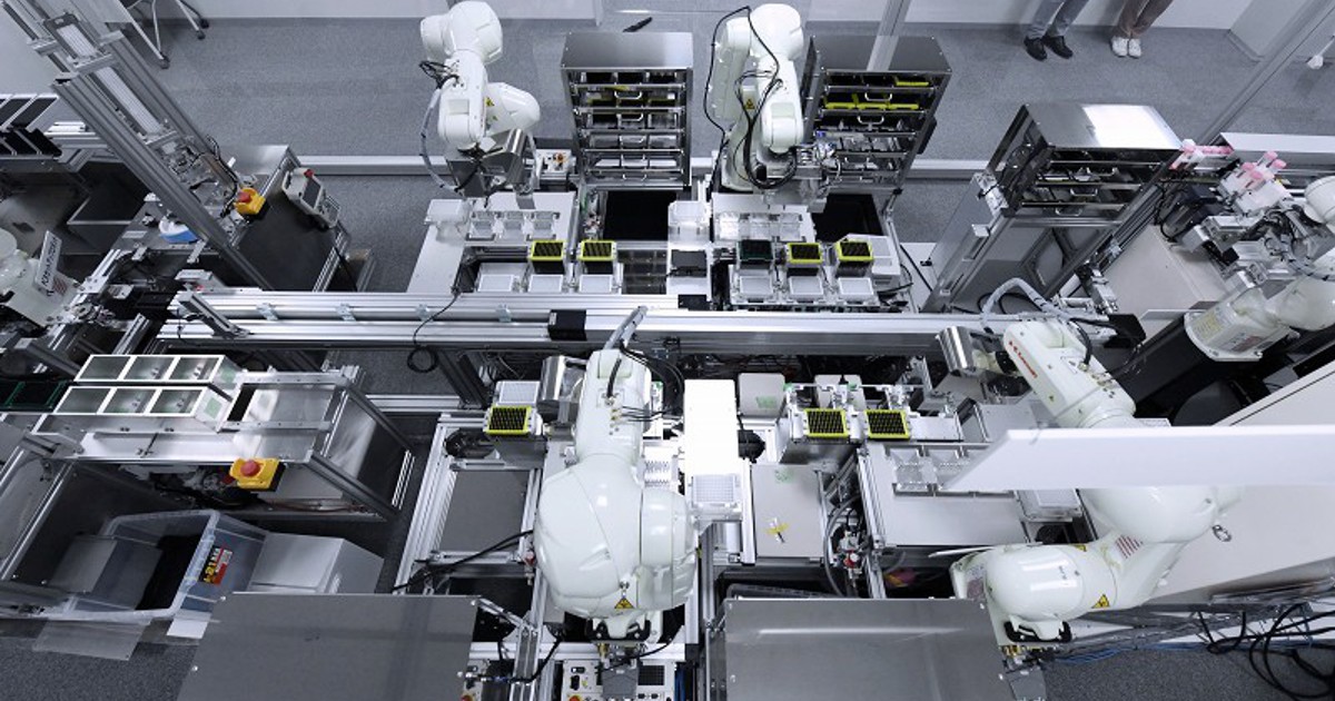 In Photos: Automated PCR testing robots developed by Japan firms ...