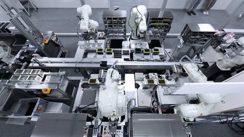 In Photos: Automated PCR testing robots developed by Japan firms ...