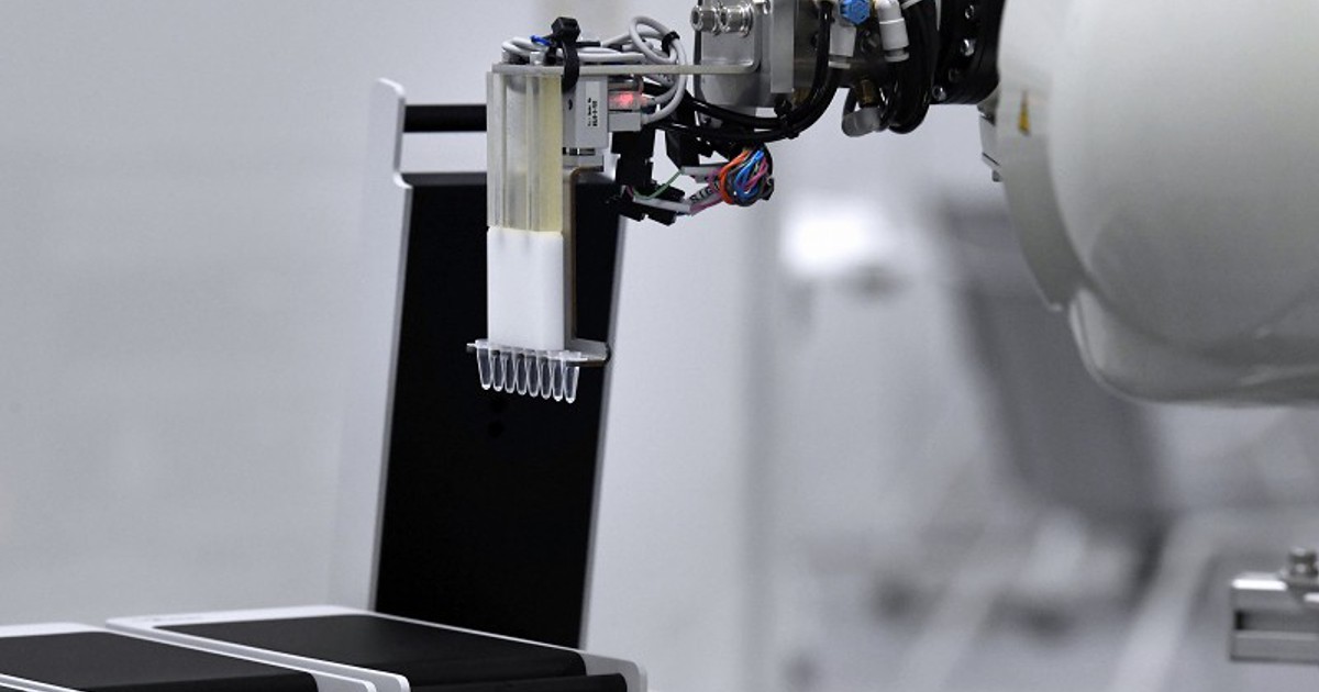 In Photos: Automated PCR testing robots developed by Japan firms ...