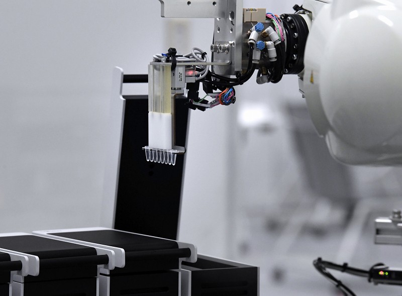In Photos: Automated PCR testing robots developed by Japan firms ...