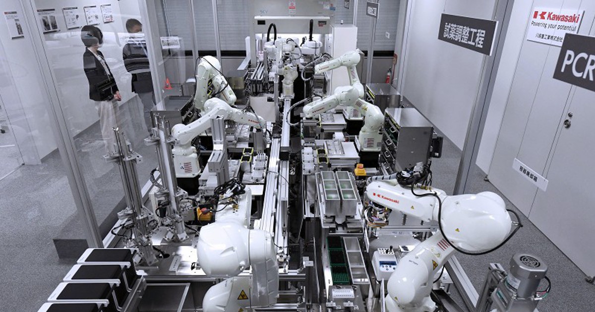 In Photos: Automated PCR testing robots developed by Japan firms ...