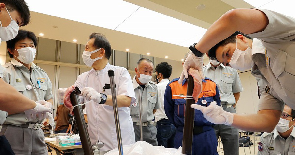In Photos: Paramedics in east Japan city undergo training to give COVID ...