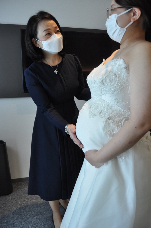 Maternity wedding dresses a hit in Japan as ceremonies pushed back amid ...