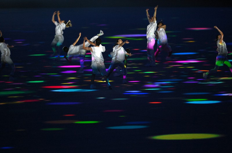 In Photos: Tokyo Olympic countdown ends with bold, colorful opening ...