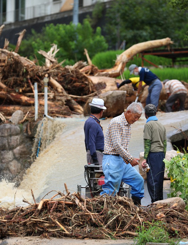 In Photos: Record heavy rains damage some 3,600 houses in wide areas of ...