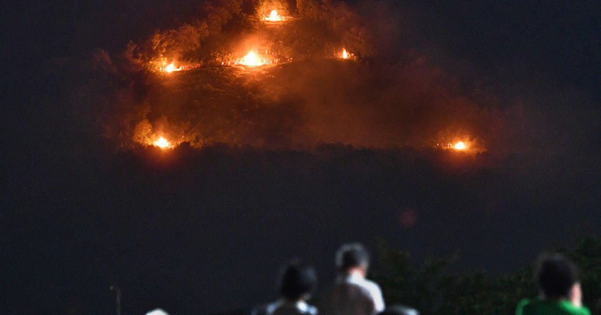 In Photos: Small-scale Kyoto hillside bonfire display held amid ...
