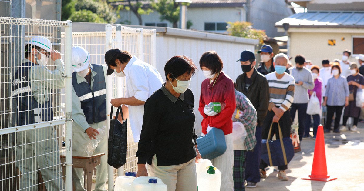 Water pipe bridge collapses in west Japan forcing people to line up for ...