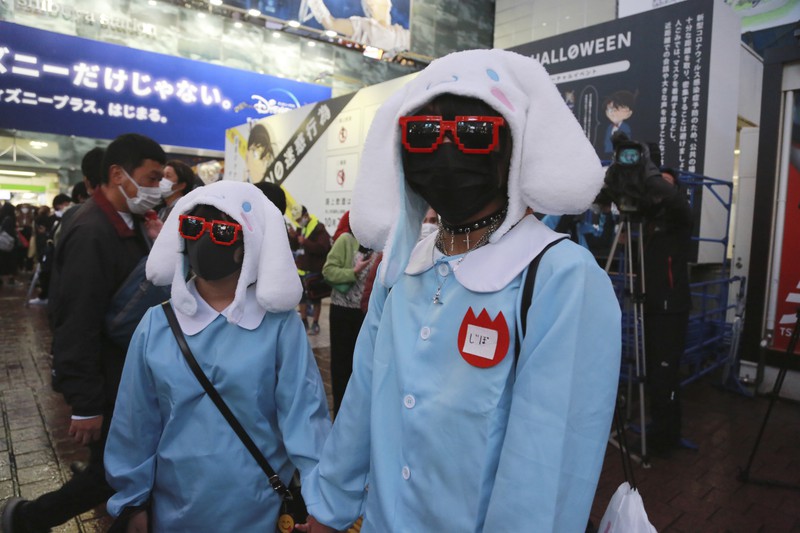 In Photos: Crowds enjoy Halloween on Tokyo streets in bright and scary ...
