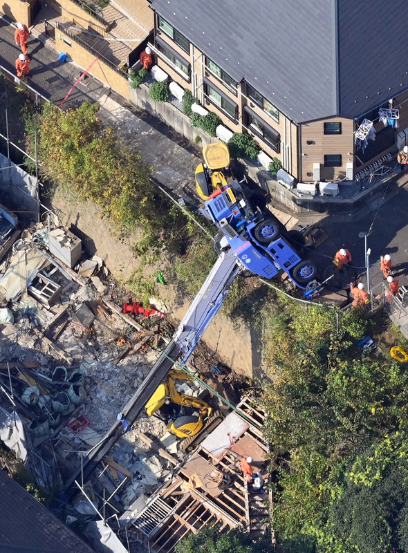Crane tips over at demolition site in Tokyo residential area - The Mainichi