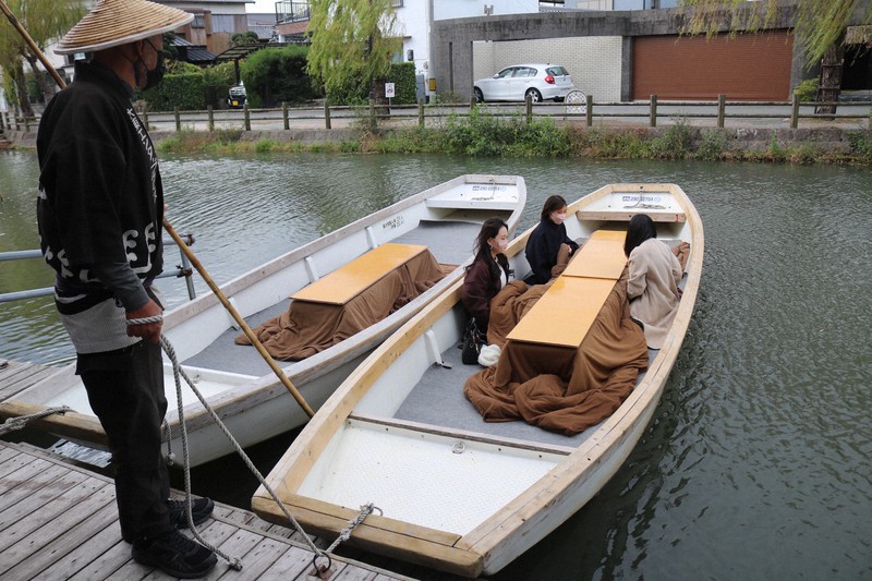 In Photos: 'Water spirit' models promote warm winter cruising in ...